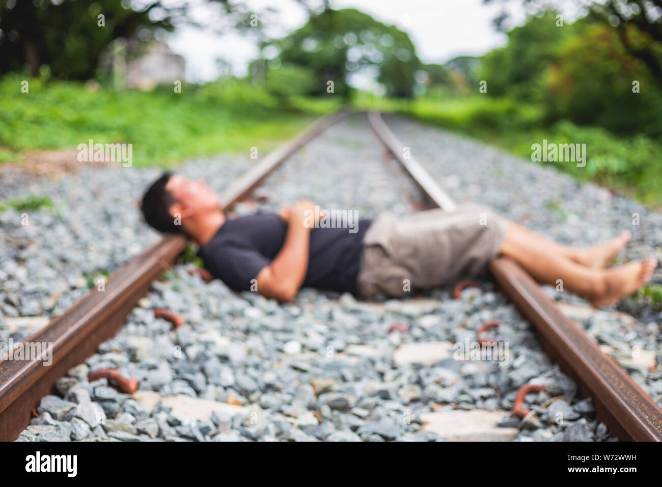 Sitting alone on railway line hi-res stock photography and images - Alamy