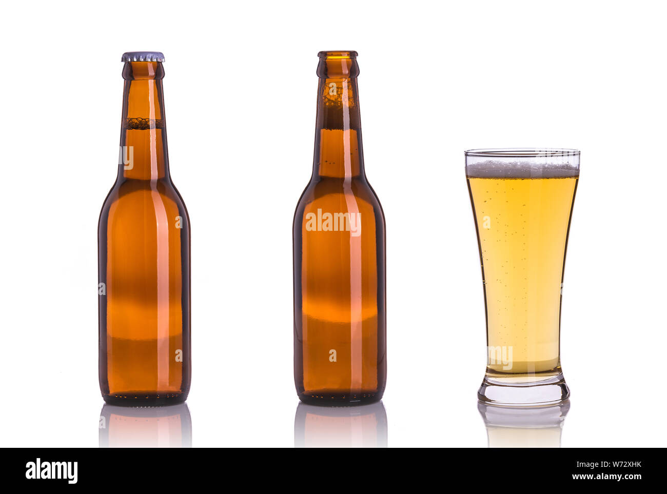 Bottle of beer without cap. Studio shot isolated on white background ...