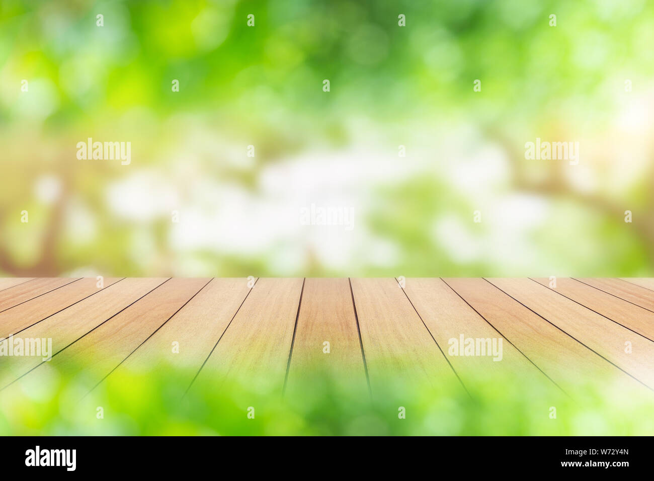 Empty wooden board or table and abstract green blurred background. Free ...