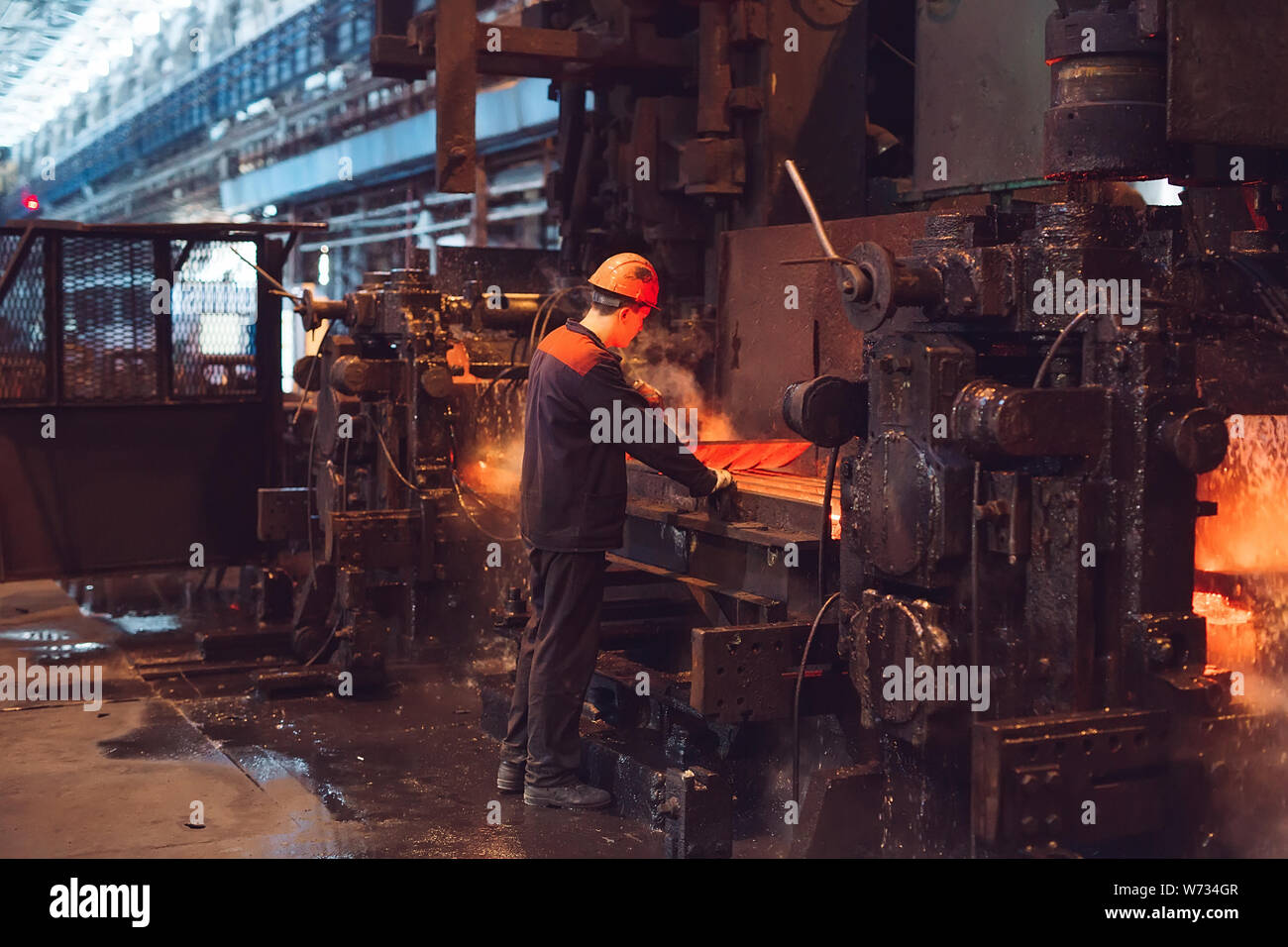 Workers in the steel mill. Metallurgical industry Stock Photo - Alamy