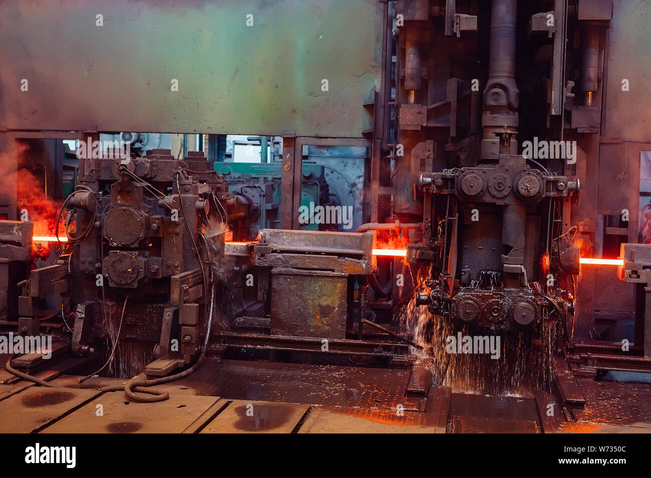 hot steel on conveyor in steel mill, Metallurgical industry Stock Photo ...