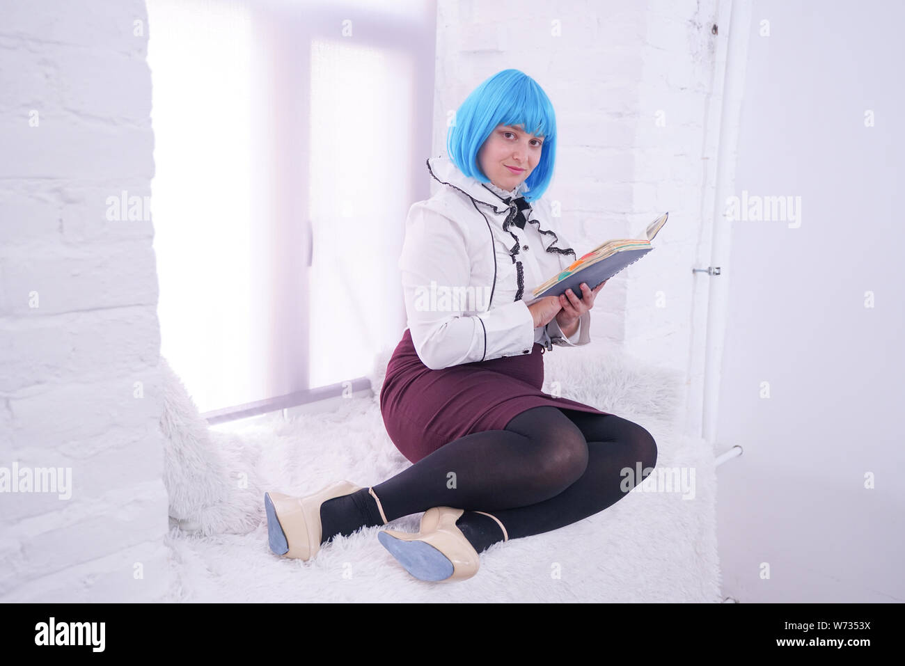 pretty plus size girl in blue wig have many dreams with her diary alone ...