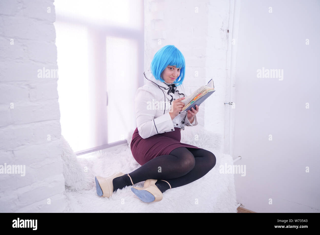 pretty plus size girl in blue wig have many dreams with her diary alone ...