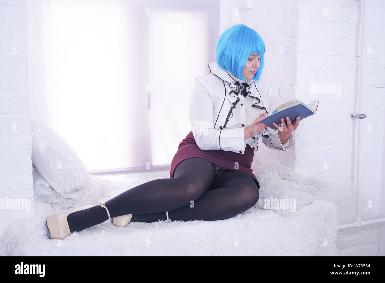 pretty plus size girl in blue wig have many dreams with her diary alone ...