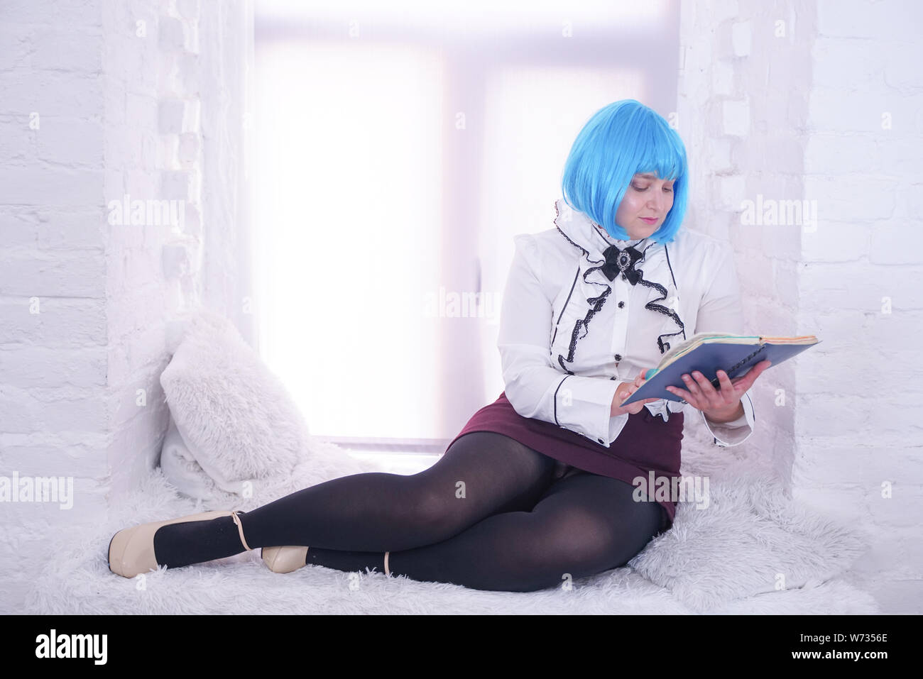 pretty plus size girl in blue wig have many dreams with her diary alone ...