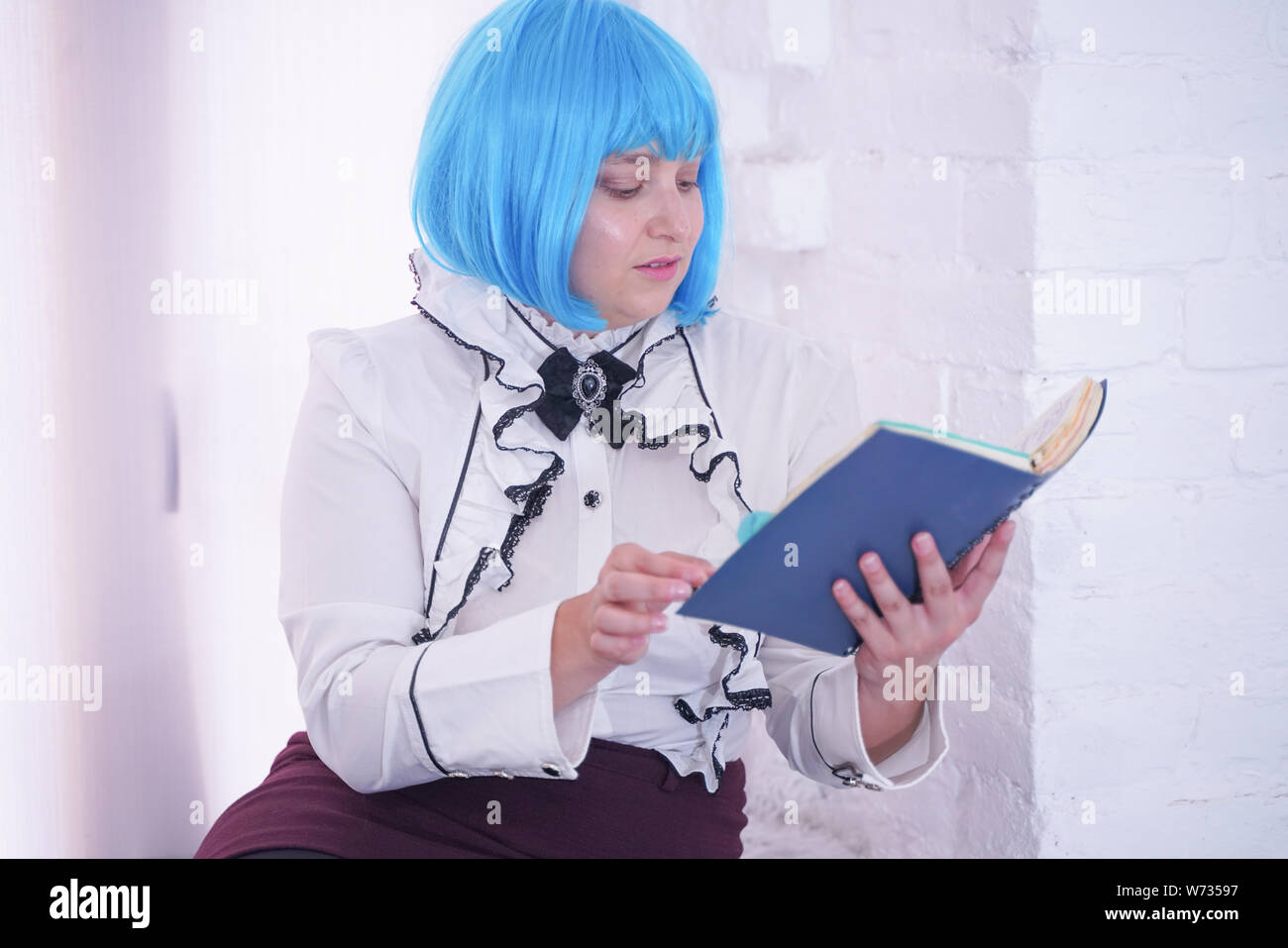 pretty plus size girl in blue wig have many dreams with her diary alone ...