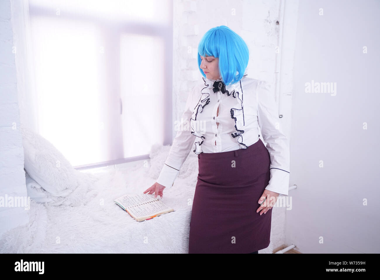 pretty plus size girl in blue wig have many dreams with her diary alone ...