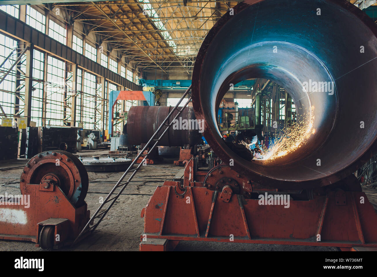 man factory interior, worker and cnc machine Stock Photo - Alamy