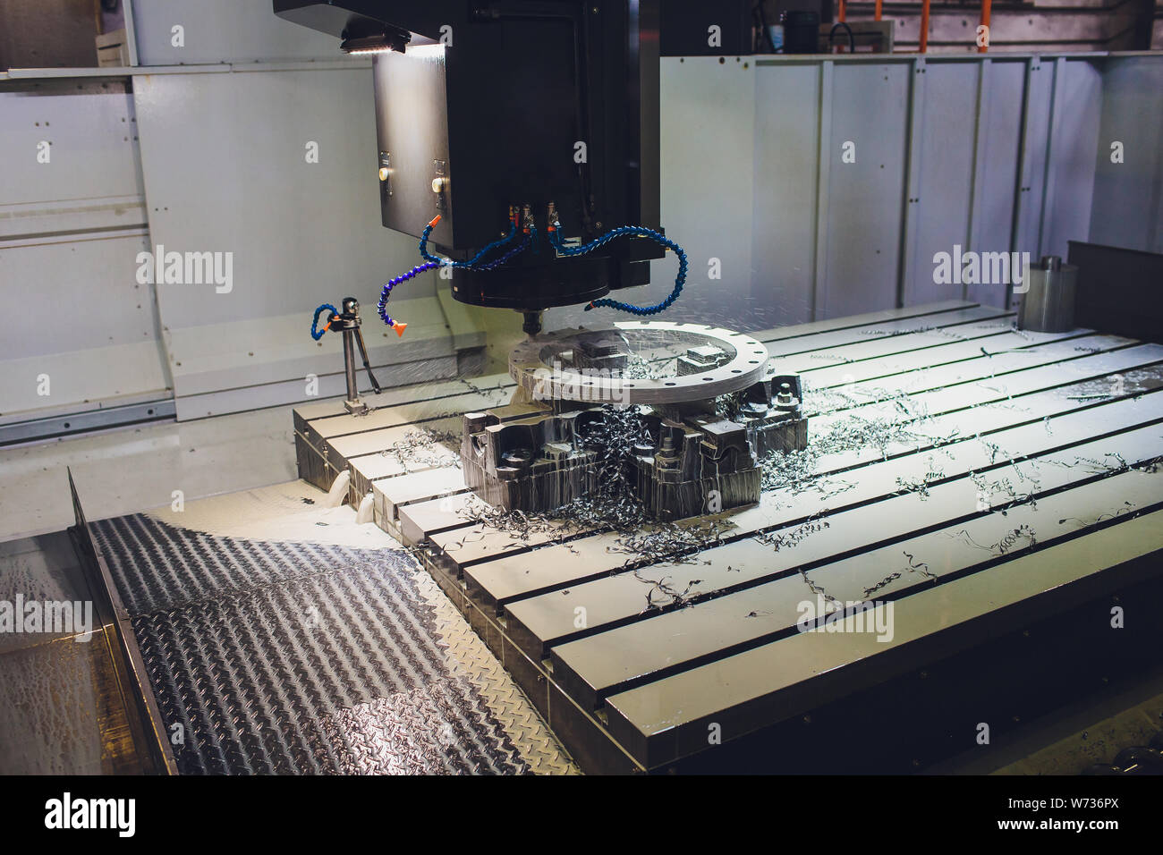 Worker male hands working with CNC machine at factory with lathes Stock ...