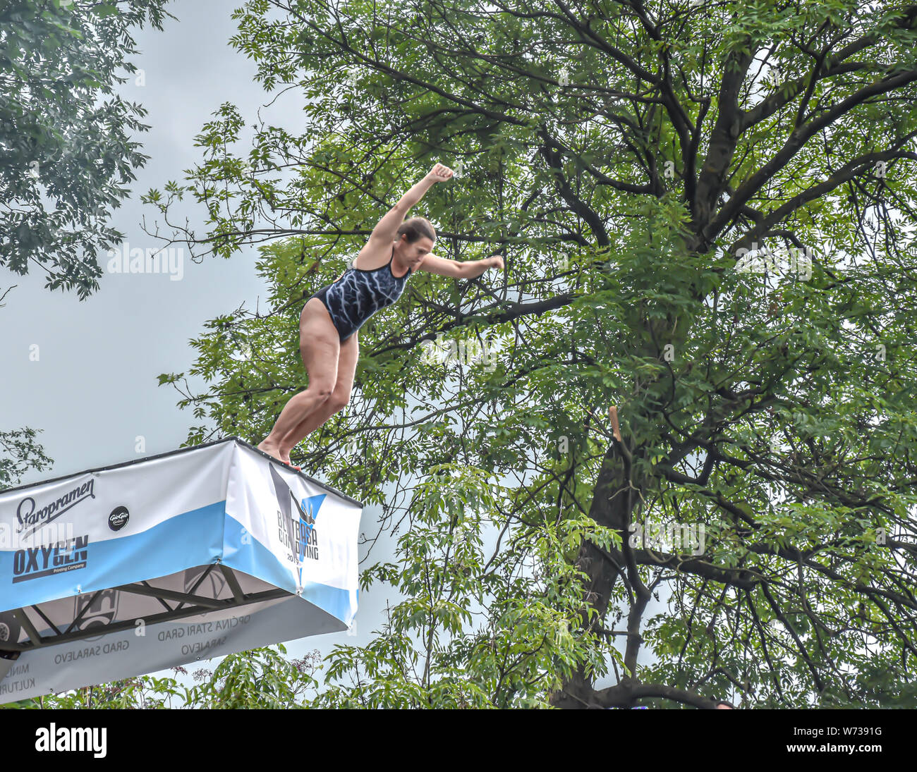 Woman diving into water splash hi-res stock photography and images - Alamy