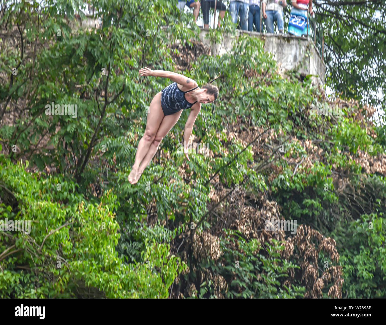 Woman diving into water splash hi-res stock photography and images - Alamy