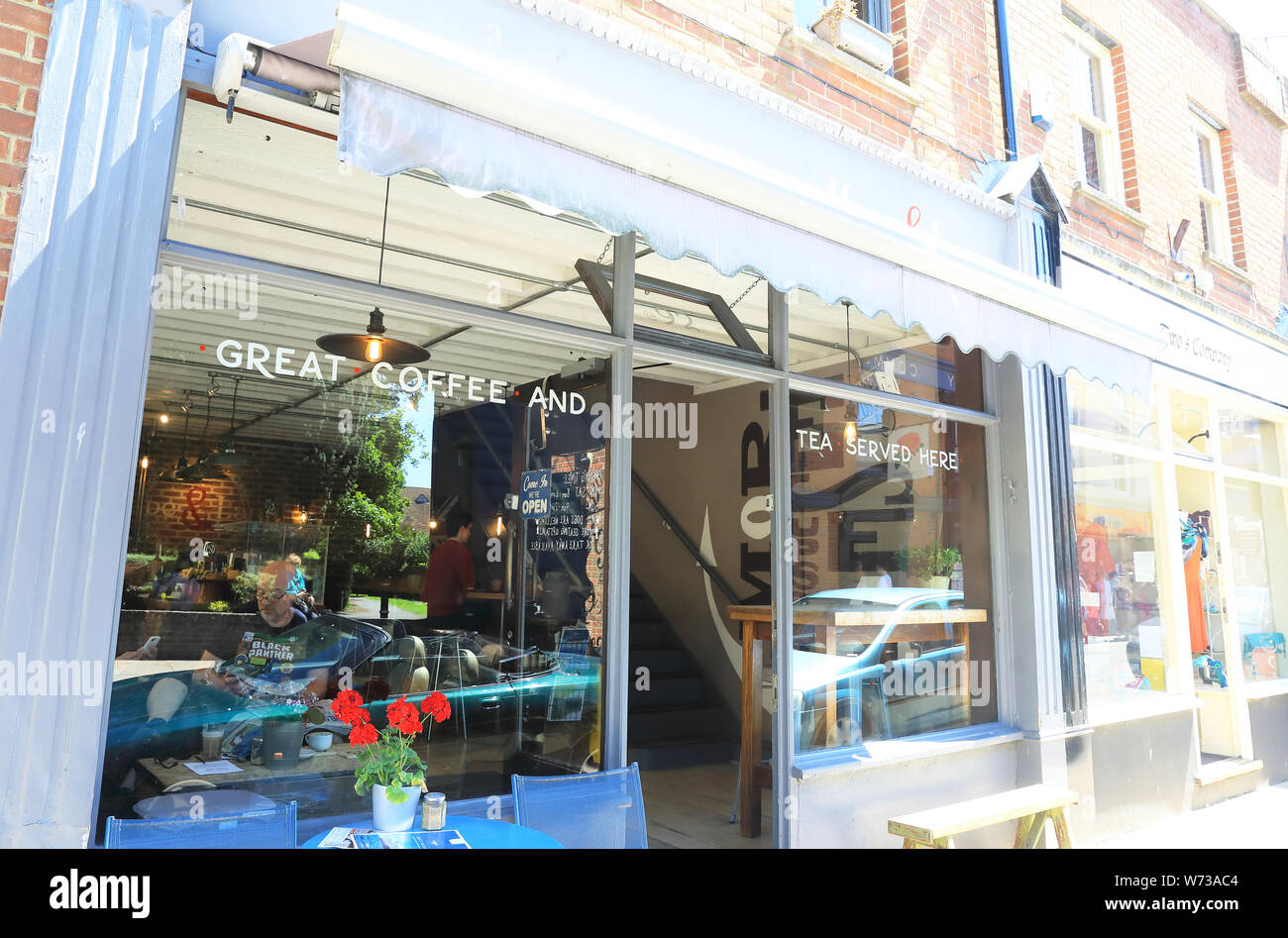 Trendy shops and cafes on Deal High Street on Kent's east coast, in ...