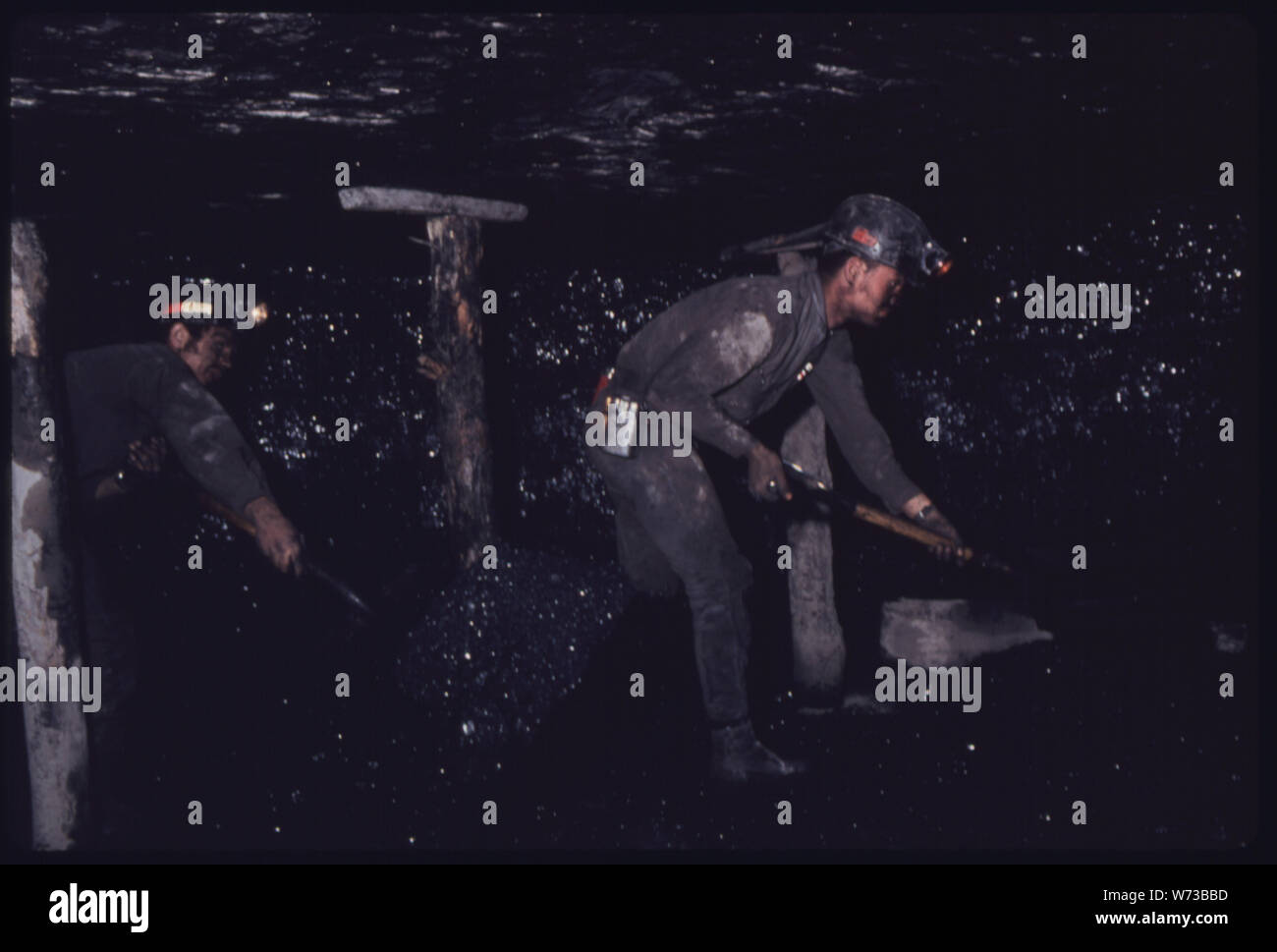 TWO MINERS ARE CLEANING OUT LOOSE COAL BY HAND SO CANVAS WALLS CAN BE ...