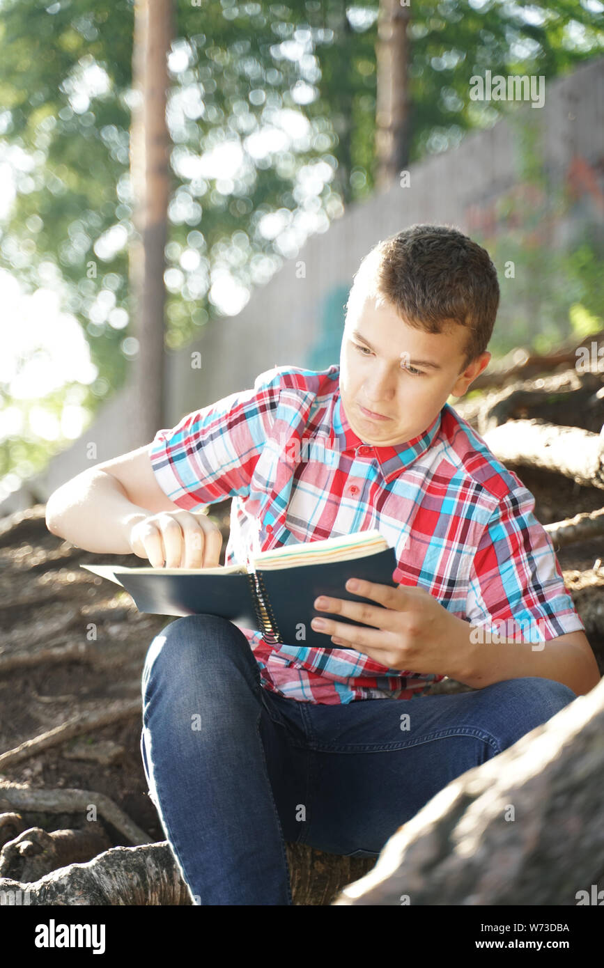 the student gets angry and tears up his notebook with the homework ...