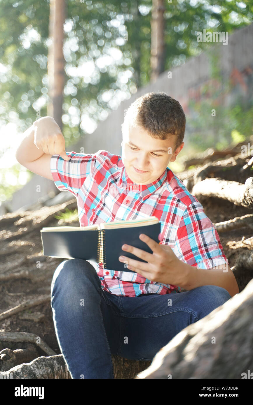the student gets angry and tears up his notebook with the homework ...