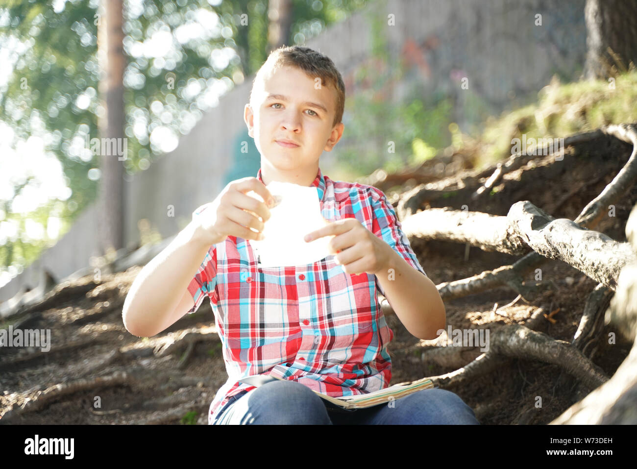 the student gets angry and tears up his notebook with the homework ...