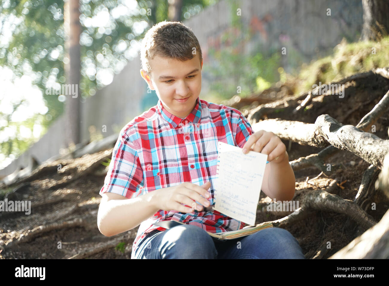 the student gets angry and tears up his notebook with the homework ...