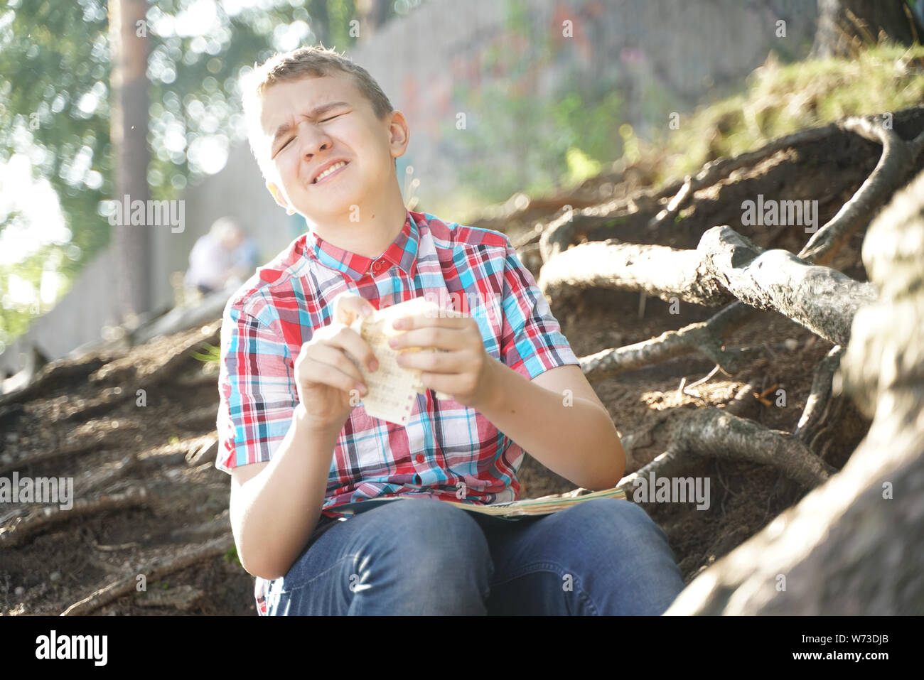 the student gets angry and tears up his notebook with the homework ...