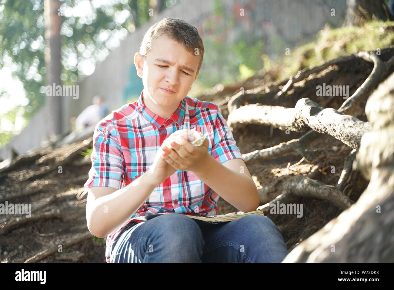 the student gets angry and tears up his notebook with the homework ...