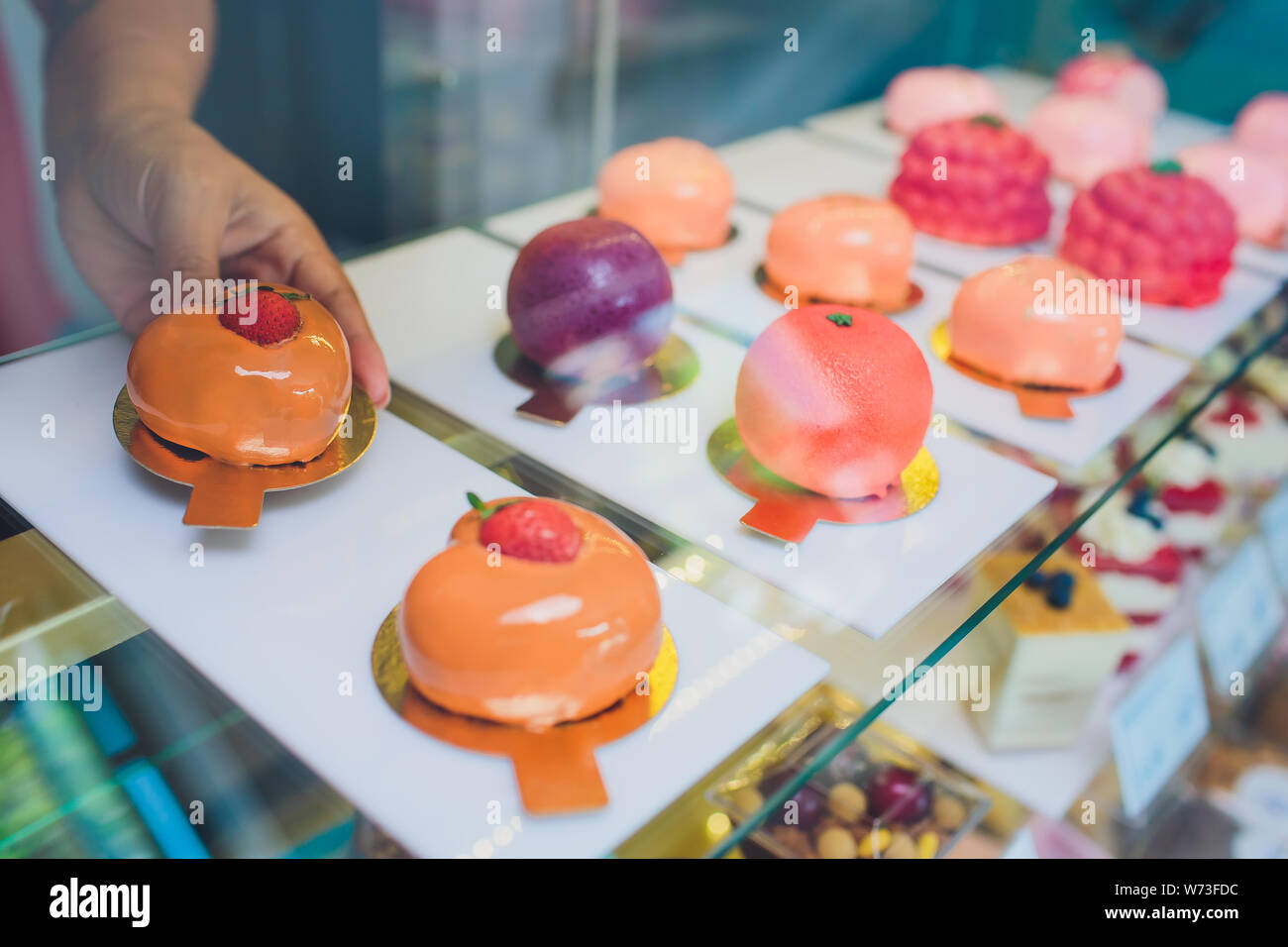 Woman taking piece cake from hi-res stock photography and images - Alamy