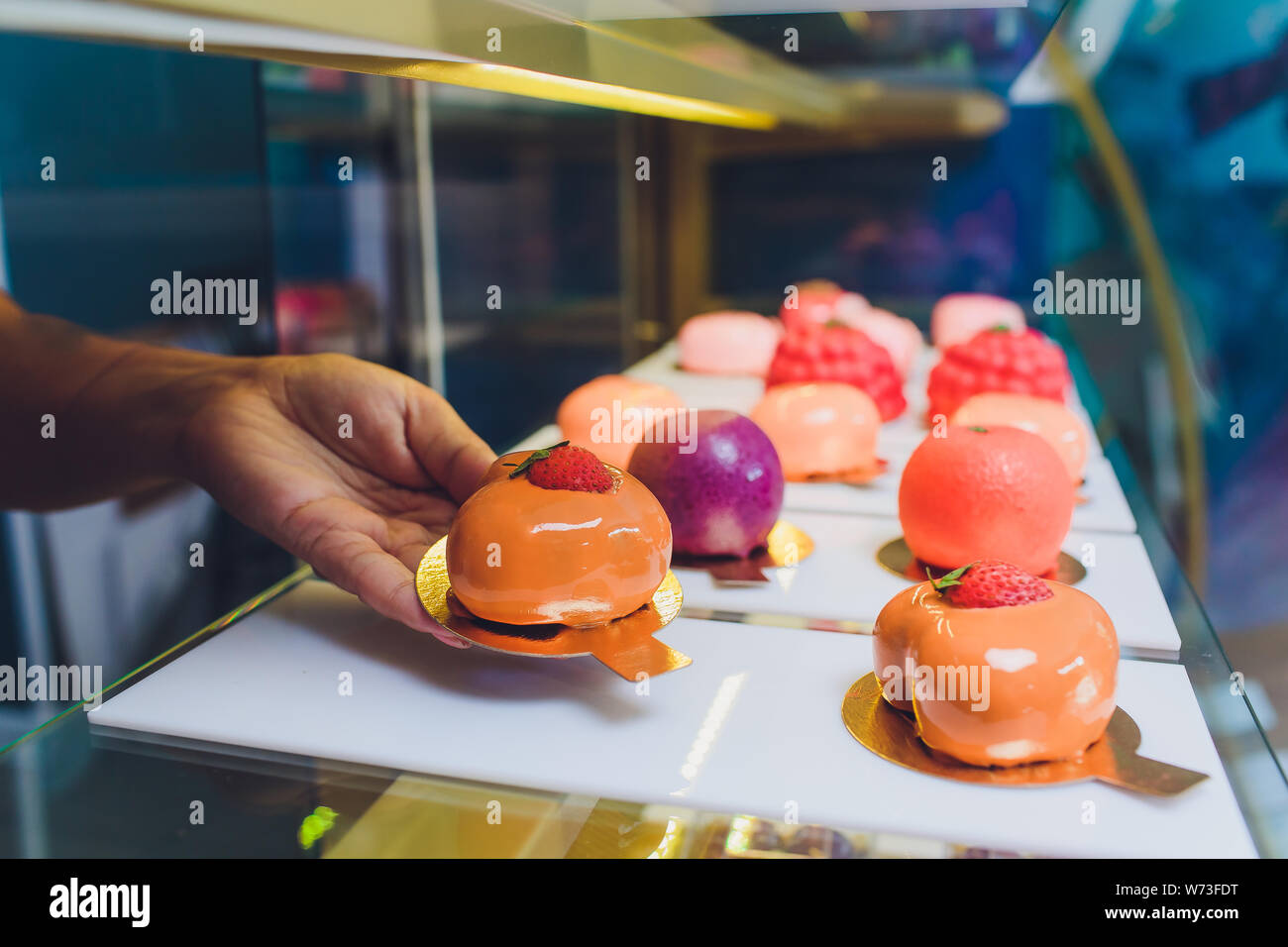 Woman taking piece cake from hi-res stock photography and images - Alamy