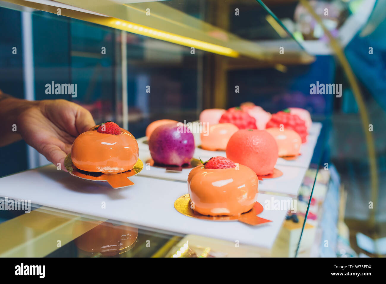 Woman taking piece cake from hi-res stock photography and images - Alamy
