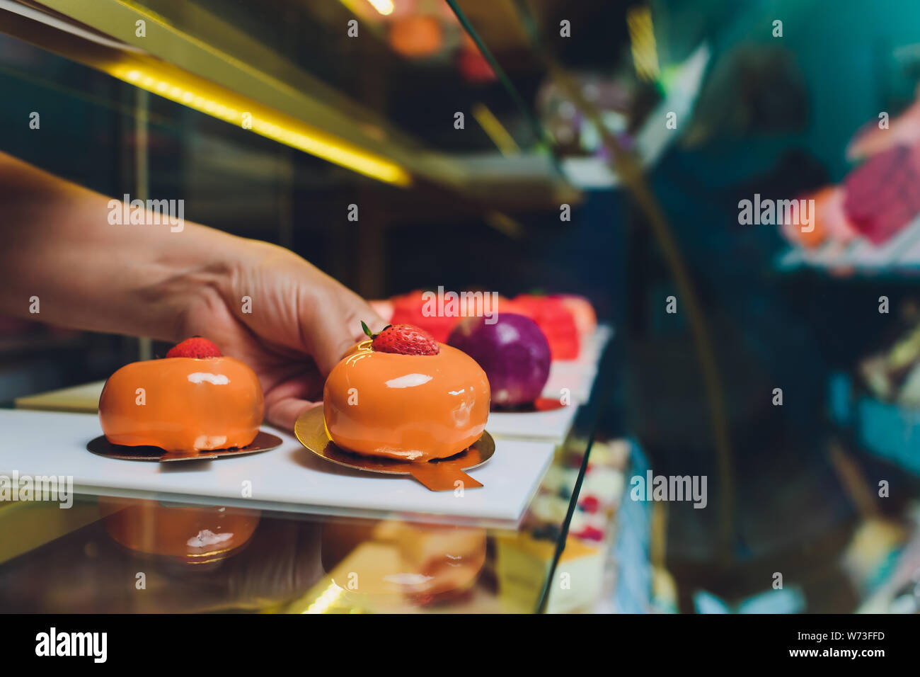 Woman taking piece cake from hi-res stock photography and images - Alamy