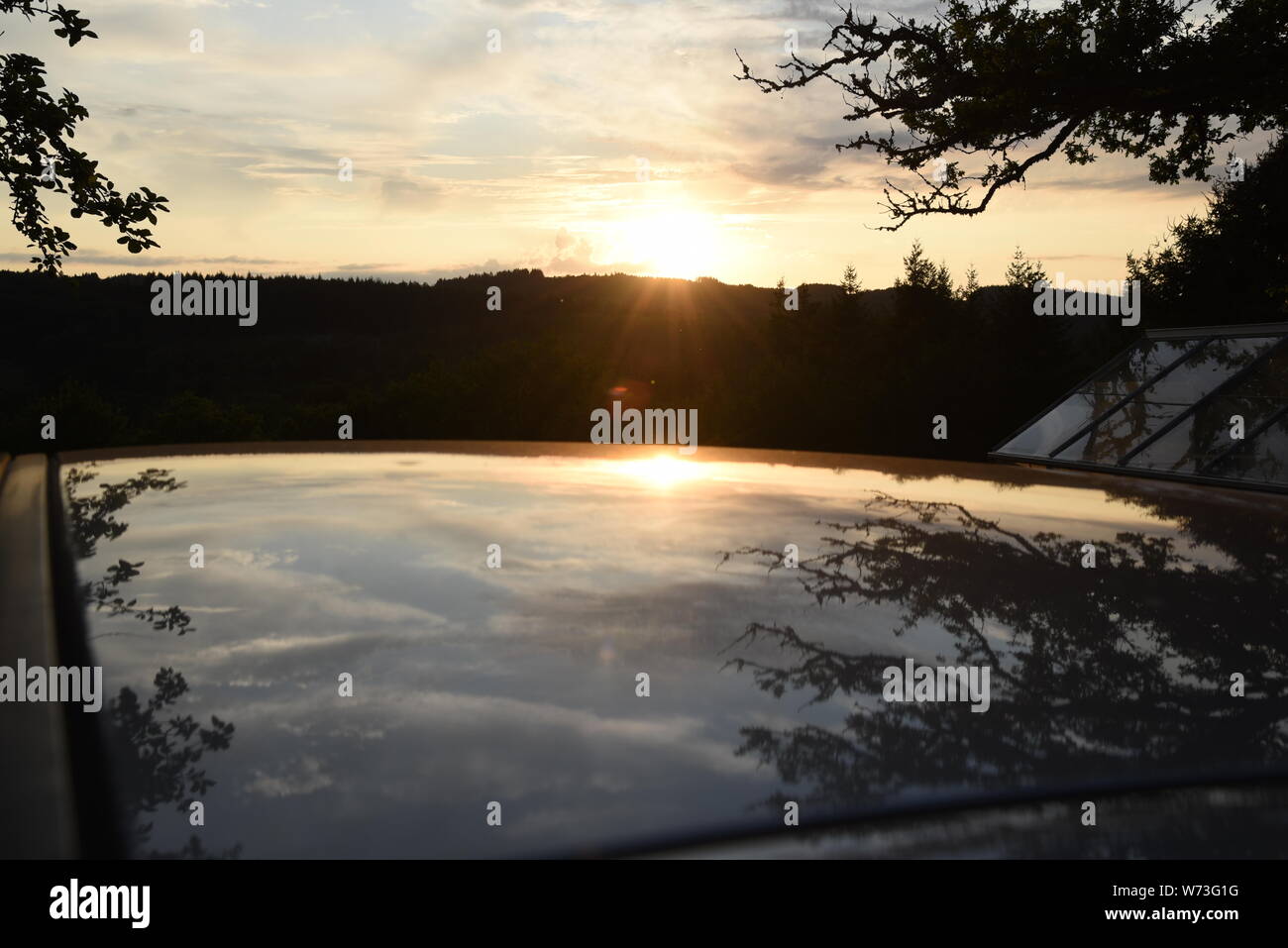 Top of Car roof with rest of the frame sky Stock Photo - Alamy