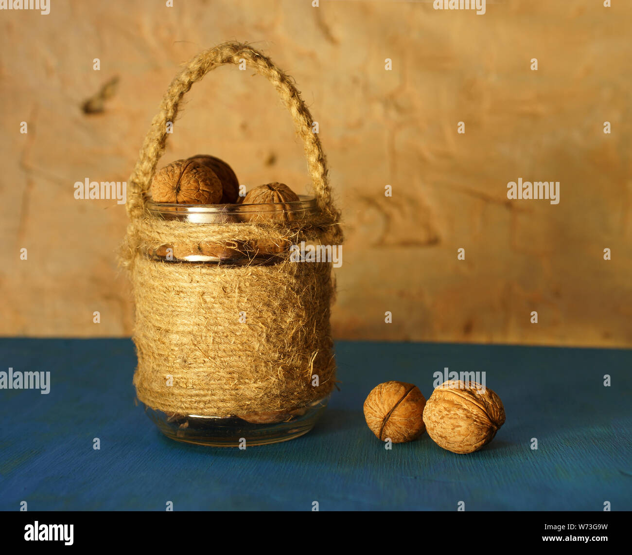 Walnuts in blue glass bowl hi-res stock photography and images - Alamy