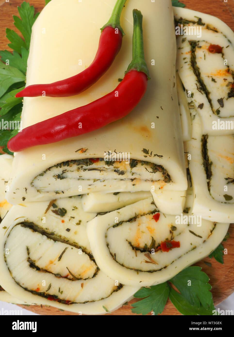 Cheese with spices. Red pepper Stock Photo - Alamy