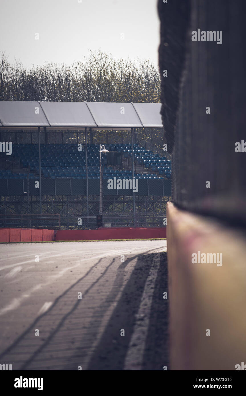 A low shot of the deserted track at Silverstone, taken in front of the ...