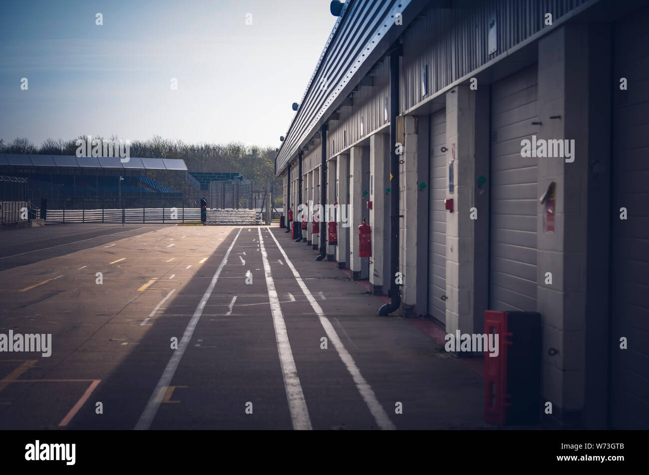 Traffic light at the exit of the deserted original pit lane at ...