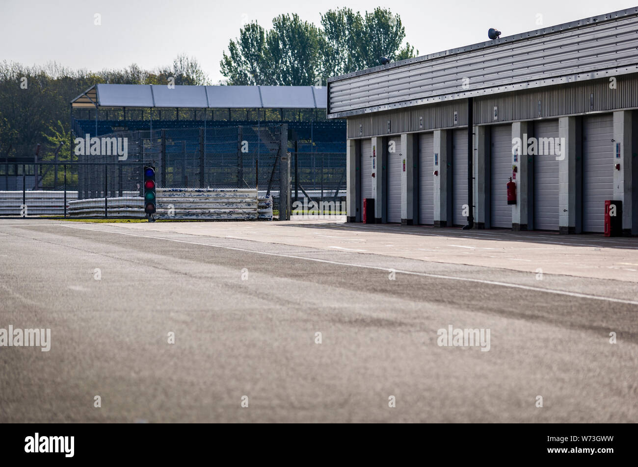 Traffic light at the exit of the deserted original pit lane at ...
