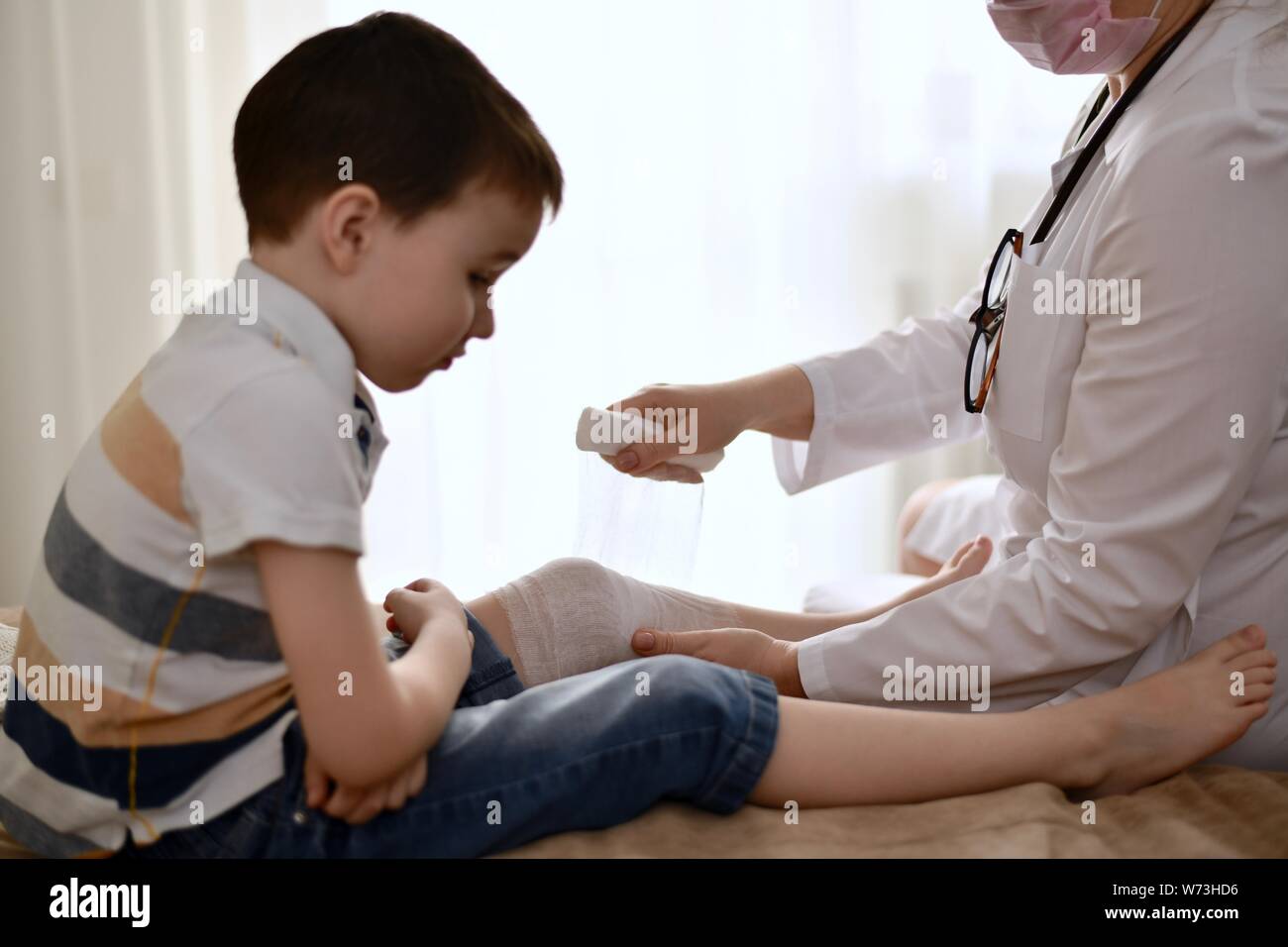 Boy head bandage hi-res stock photography and images - Alamy