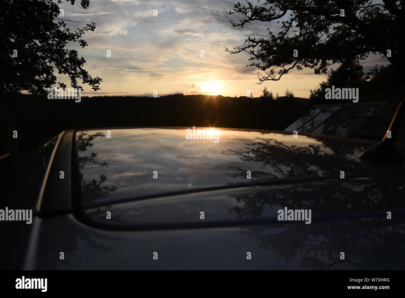 Top of Car roof with rest of the frame sky Stock Photo - Alamy