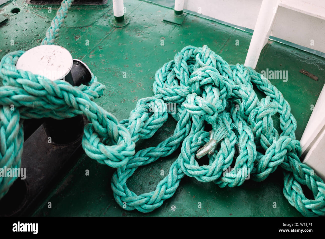 An old blue frayed boat rope. Nautical background. Turquoise nautical ...