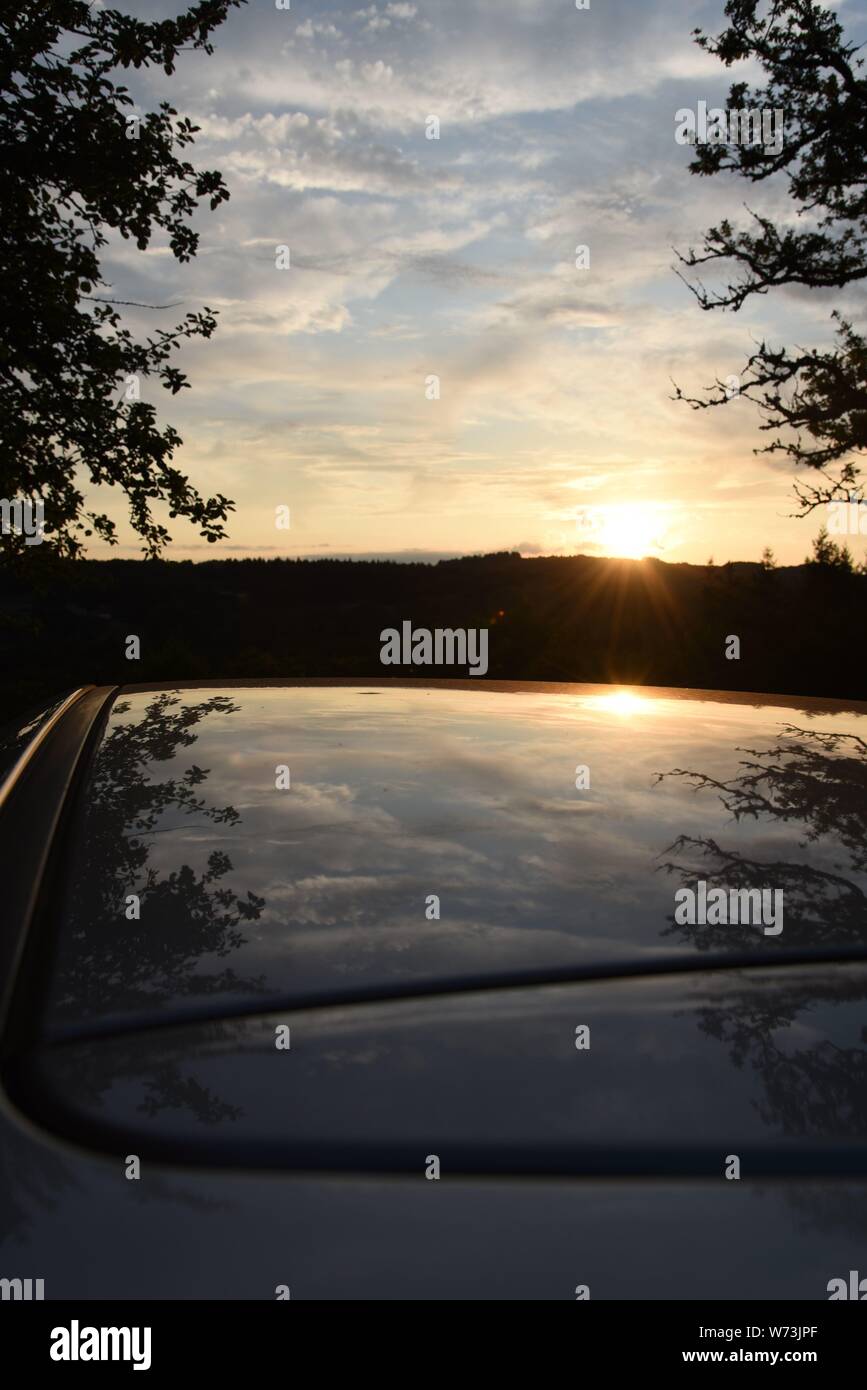 Top of Car roof with rest of the frame sky Stock Photo - Alamy