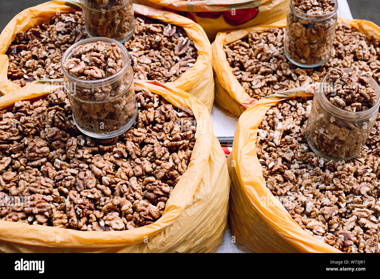 Bags full of walnuts. Fresh walnut packed into the plastic bag ...