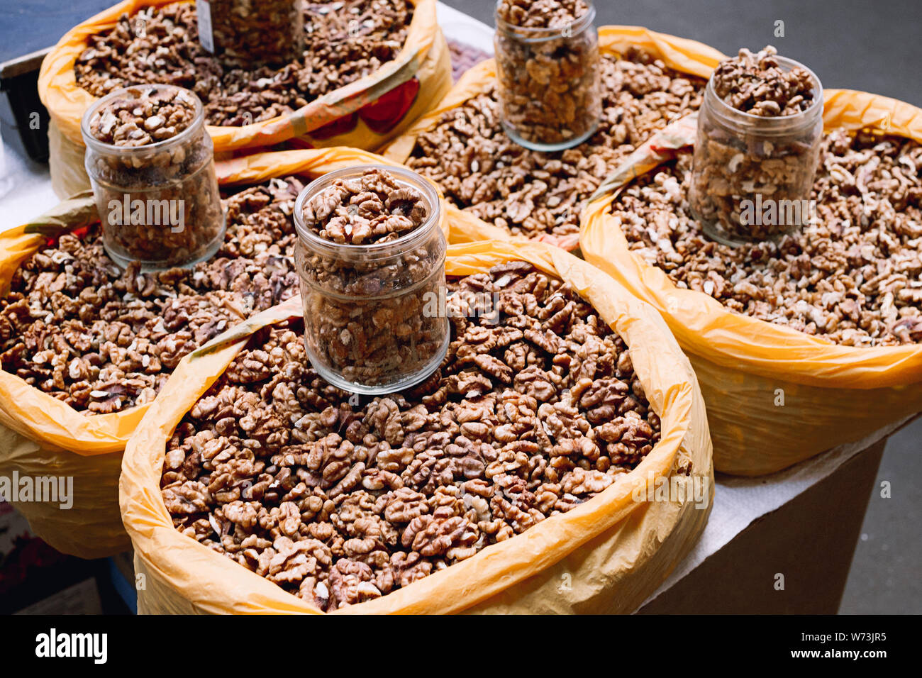 Bags full of walnuts. Fresh walnut packed into the plastic bag ...