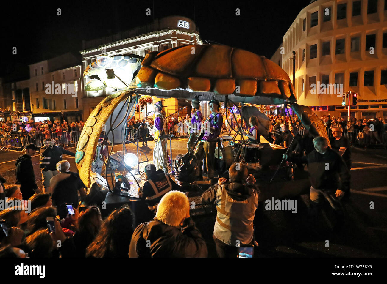 The Spraoi parade make its way through Waterford city in southeast ...