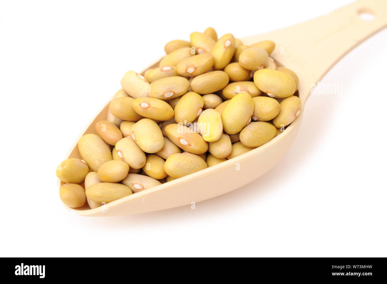 a group of perruano bean in scoop on white background Stock Photo - Alamy