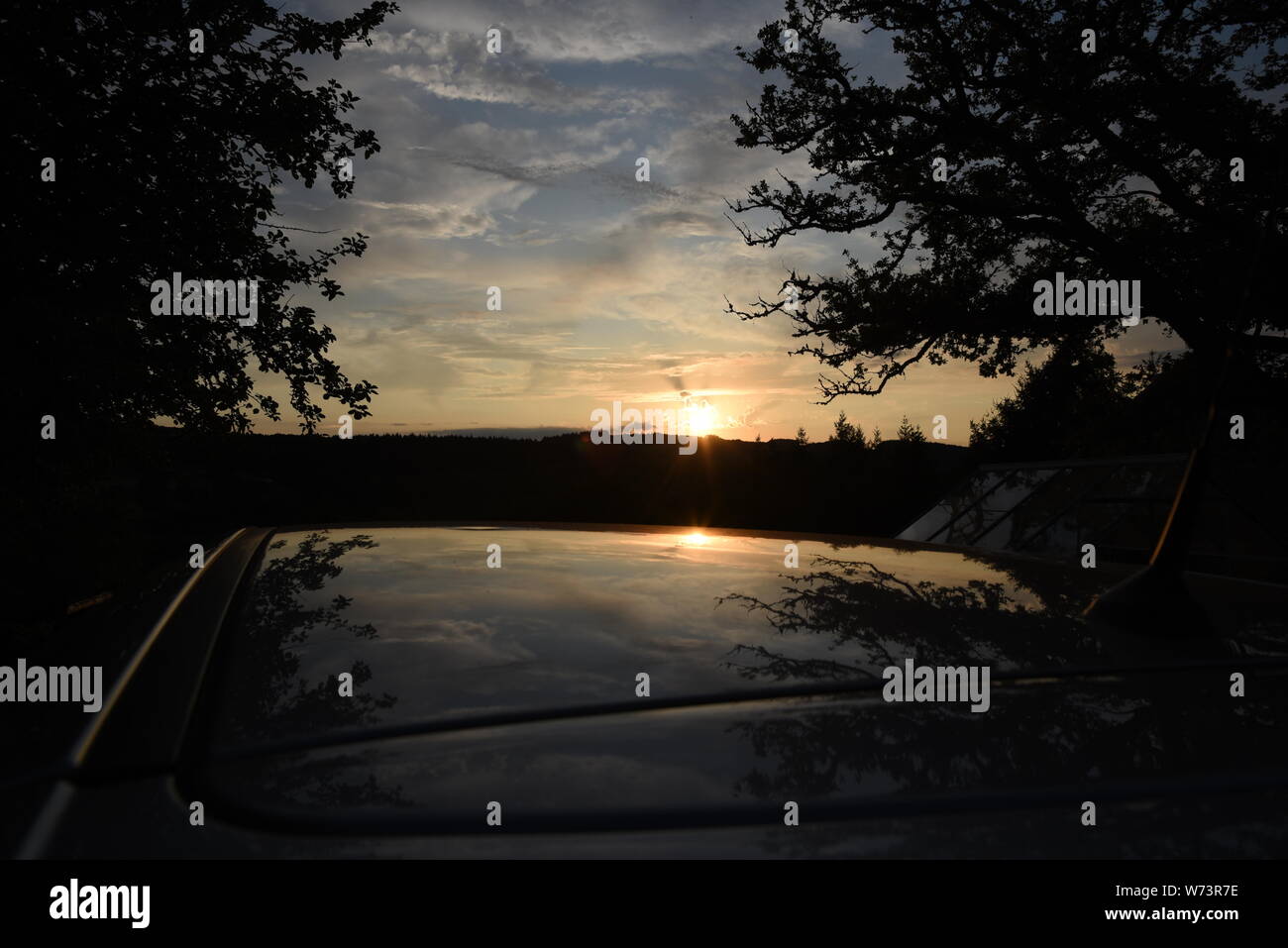 Top of Car roof with rest of the frame sky Stock Photo - Alamy