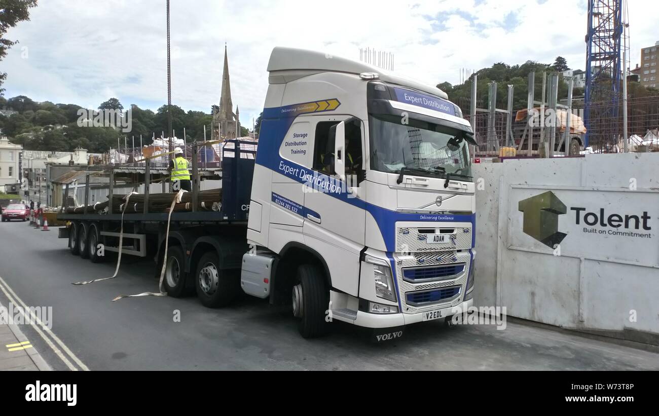 A Volvo lorry with flat bed trailer delivering metal to the Torwood ...