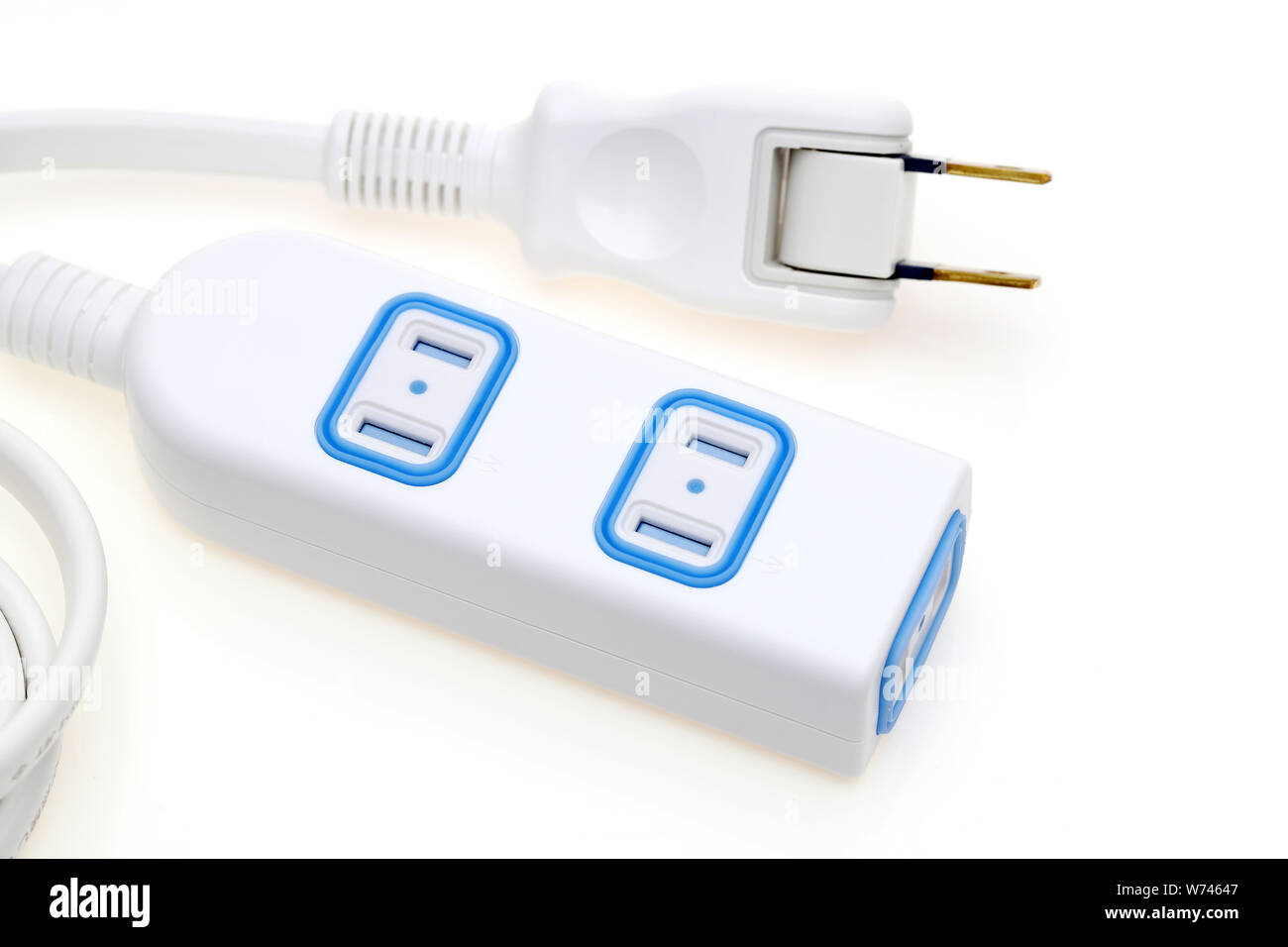 Electric extension strip isolated on white background Stock Photo - Alamy