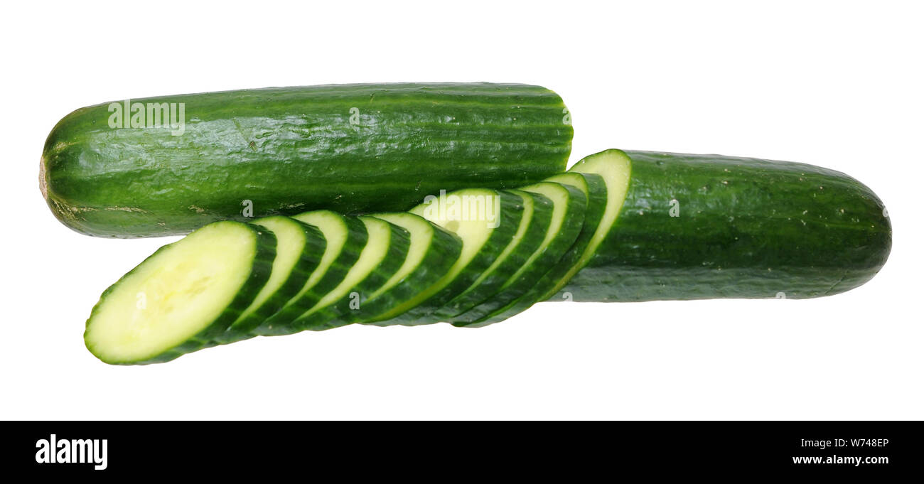 sliced and whole cucumber isolated on white background Stock Photo - Alamy
