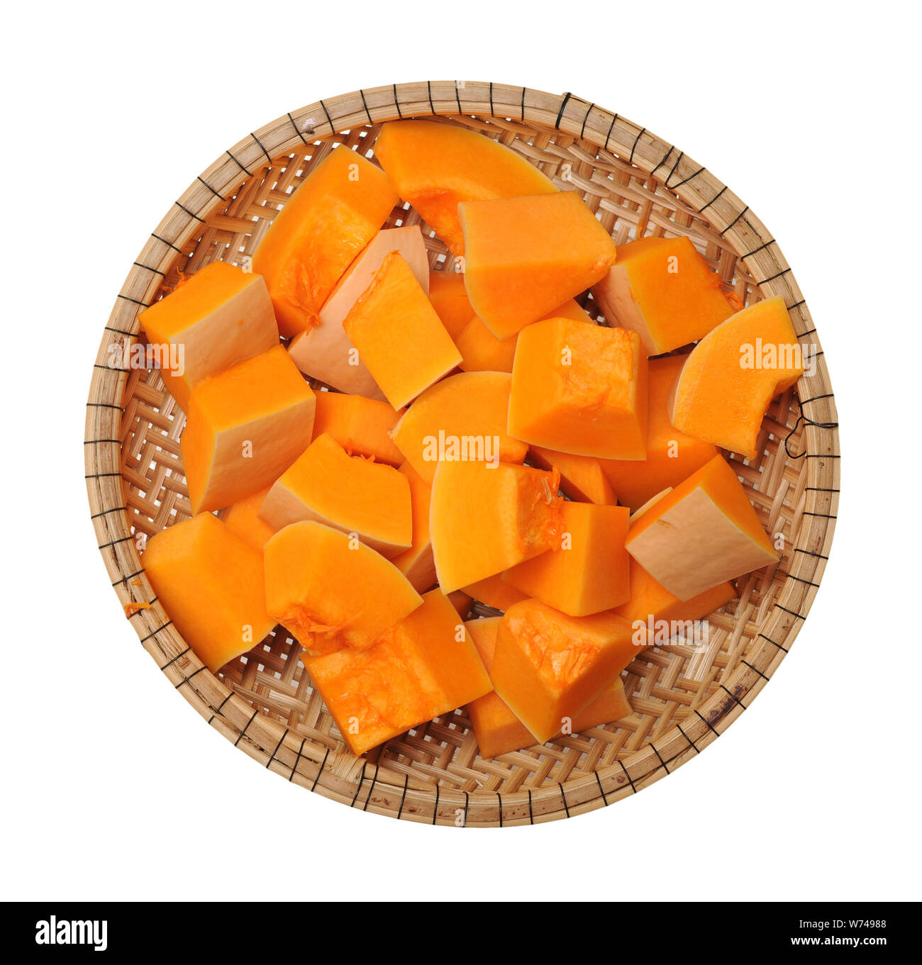 chopped pumpkin on bamboo basket isolated on white background Stock ...