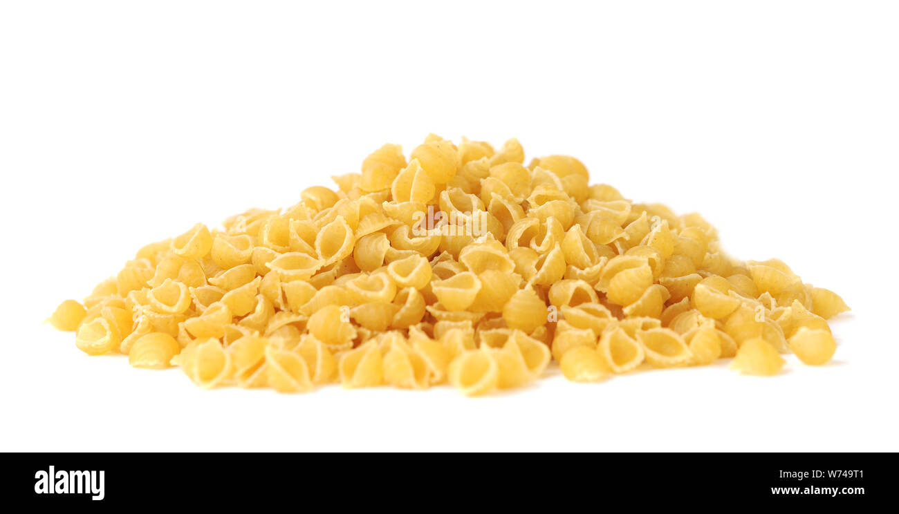 shell shape pasta on white background Stock Photo - Alamy