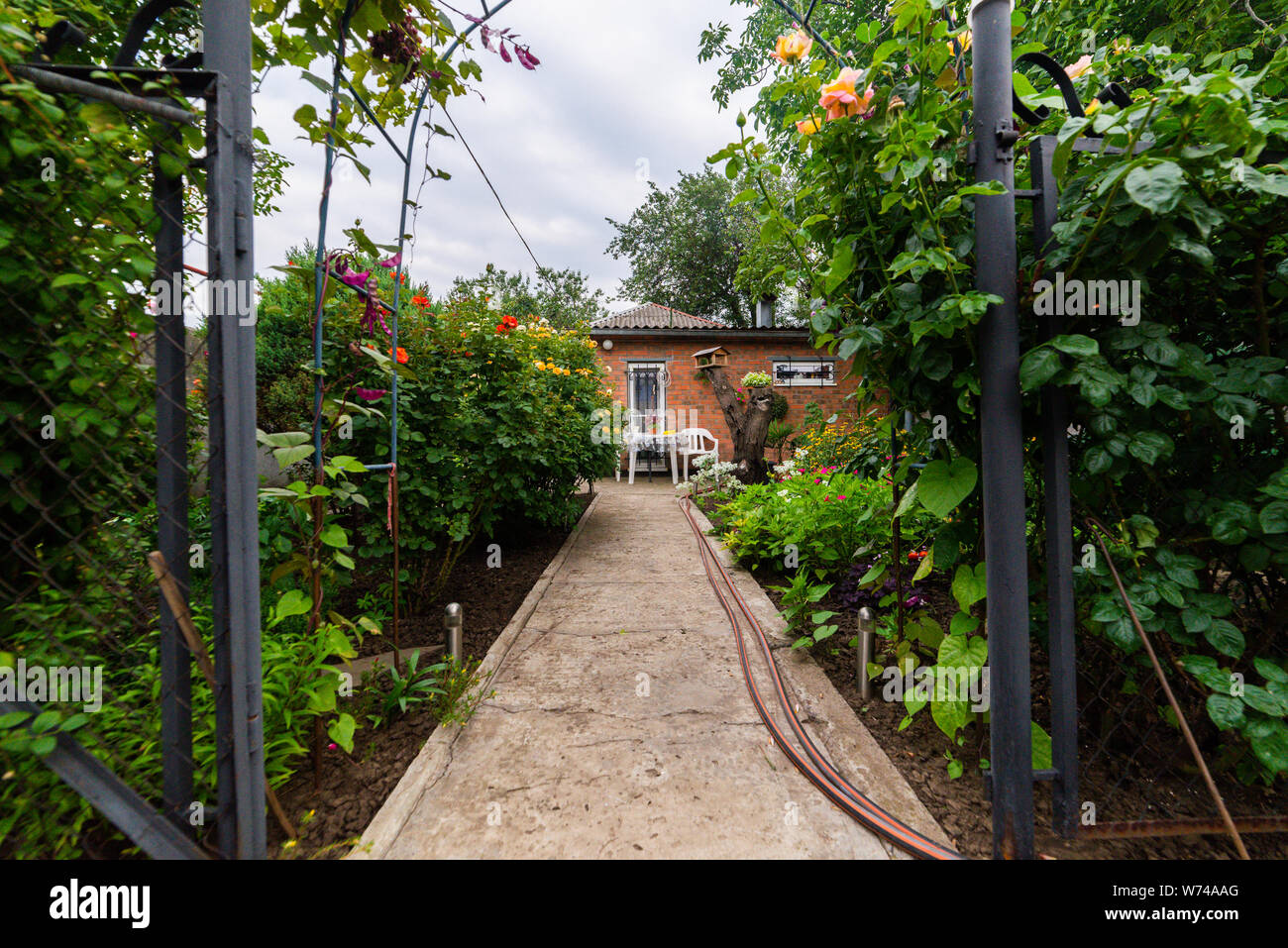 Landscaping in the garden. The path in the garden Stock Photo - Alamy
