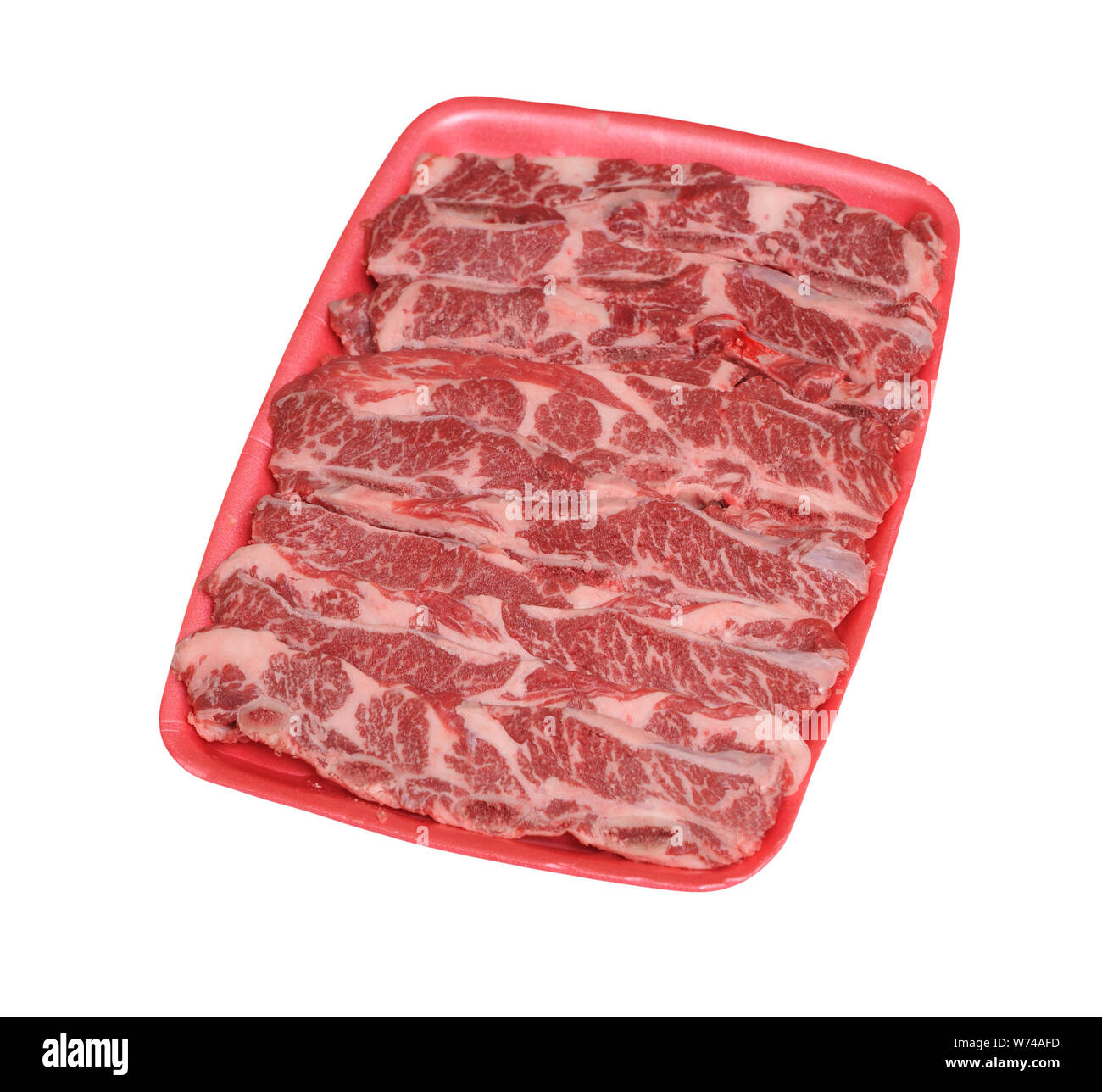 beef ribs in tray isolated on white background Stock Photo - Alamy