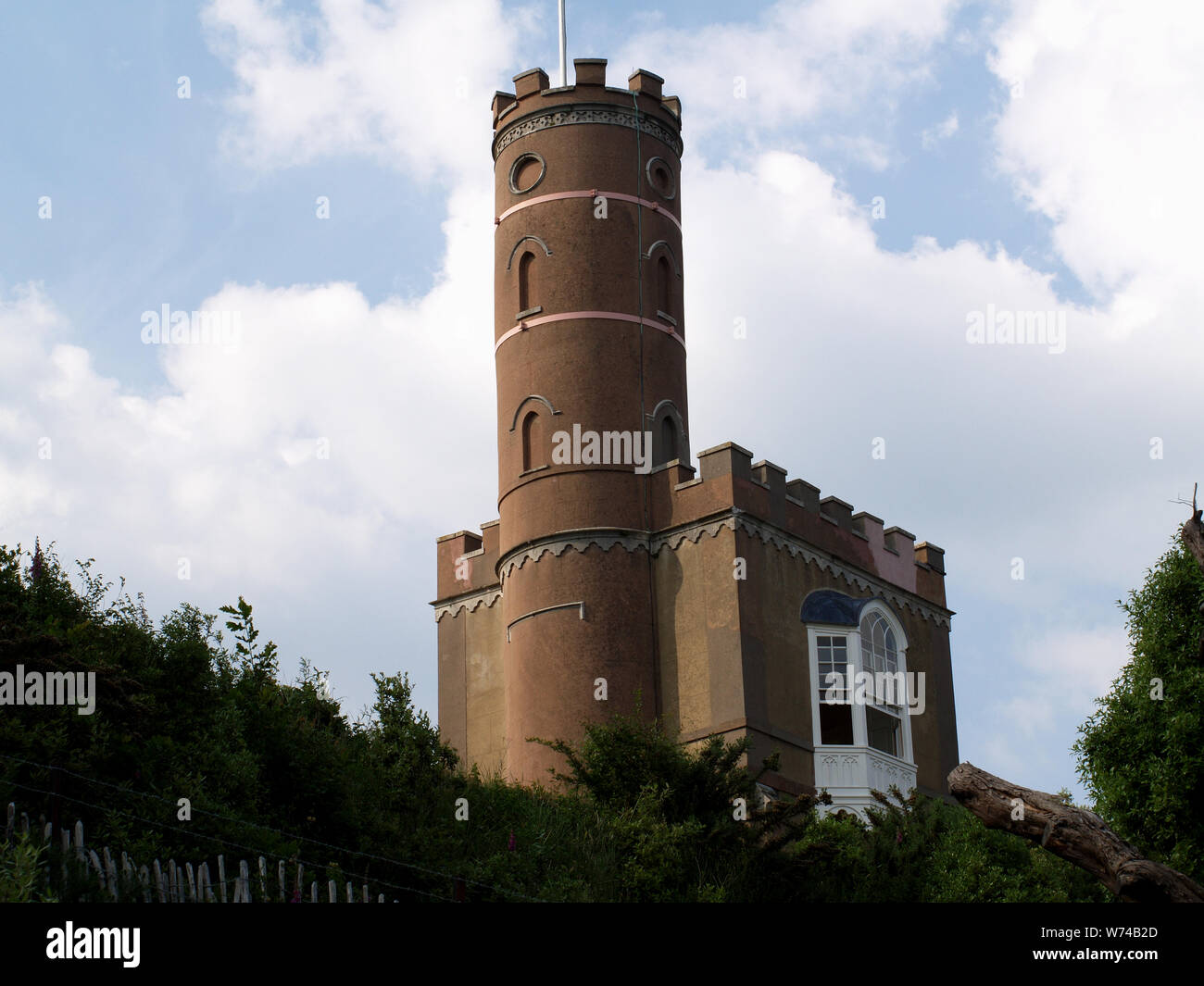 Luttrell's Tower, a 3 story stuccoed yellow brick folly at Calshot ...